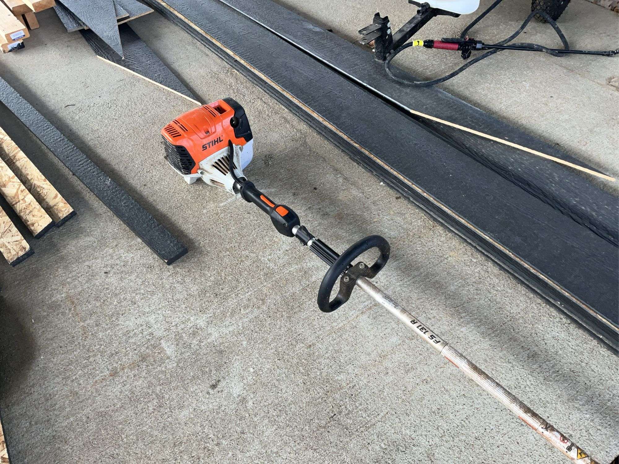 Stihl FS131R weed eater - Kaufman Realty & Auctions