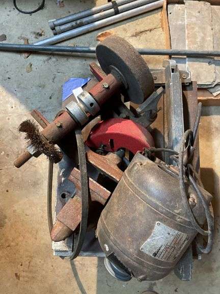 Table saw, bench grinder, and vice - Kaufman Realty & Auctions