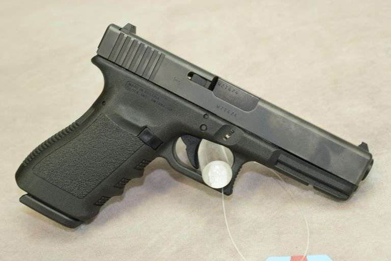 Glock Mod 20 Cal 10MM - Kaufman Realty & Auctions