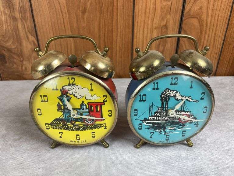 (2) antique alarm clocks- train engine & ship - Kaufman Realty & Auctions