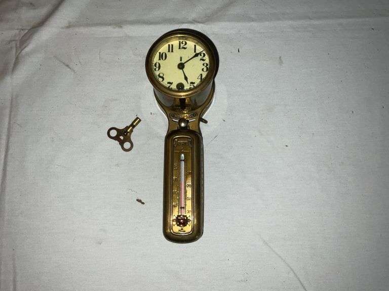 Jewell brass windup clock - Kaufman Realty & Auctions