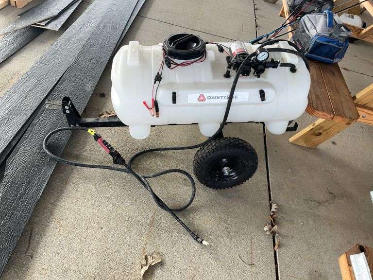 County line 12V pull behind sprayer - Kaufman Realty & Auctions