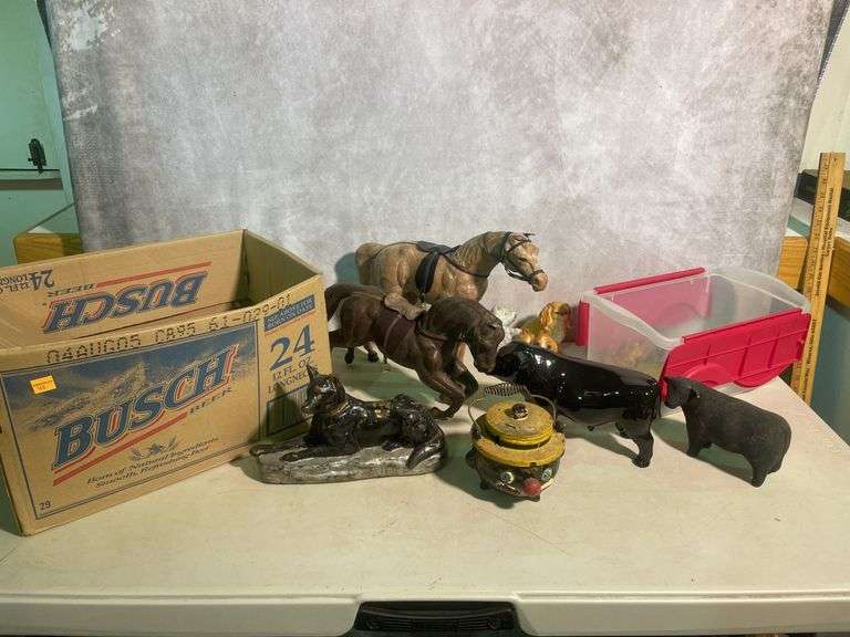 Cast iron dog figurine, other decorative animals, silverware and mini ...