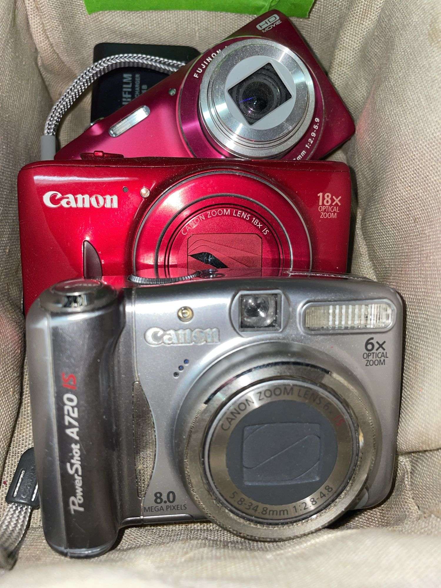 ASSORTED CAMERAS-CANNON 18X OPTICAL ZOOM, FUJIFILM & CANNON POWERSHOT ...