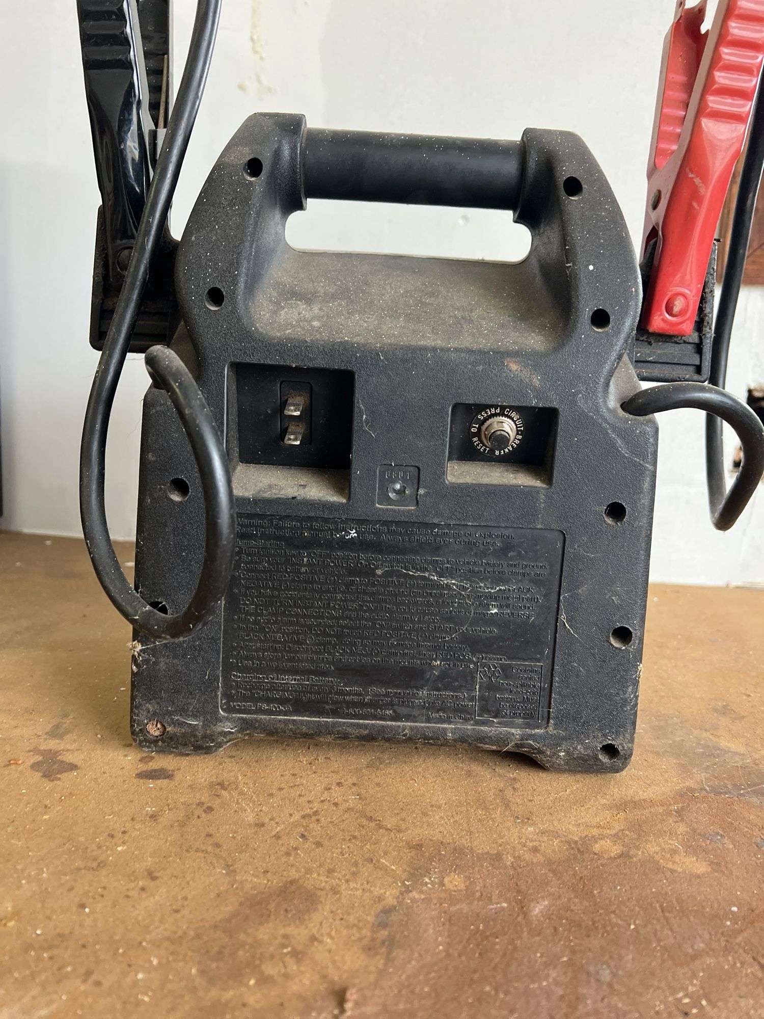 Instant Power battery charger - Kaufman Realty & Auctions