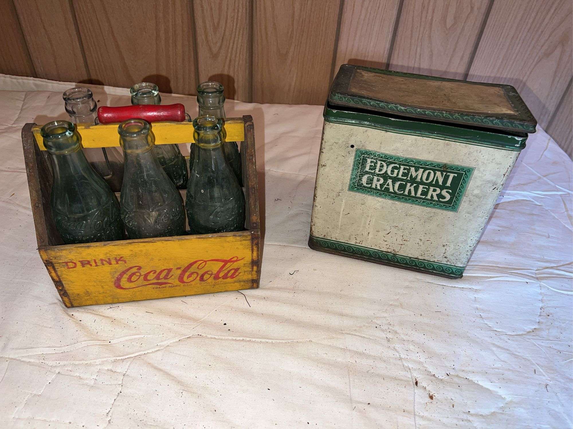 Vintage tin and Coca-Cola glass bottles with wooden Coca-Cola box ...