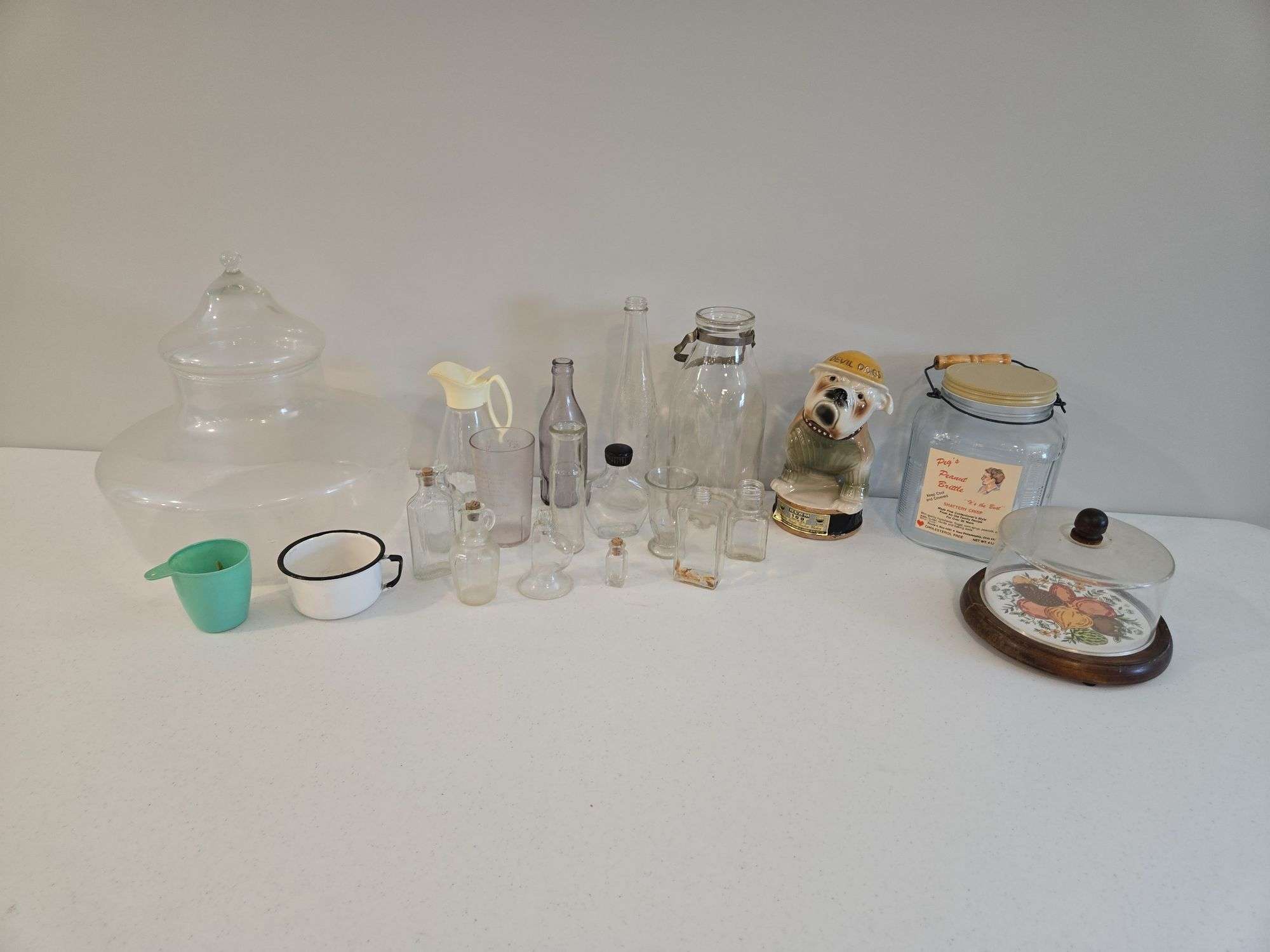 Beam dog decanter, misc glass bottles, Peg's glass jar, ect - Kaufman ...