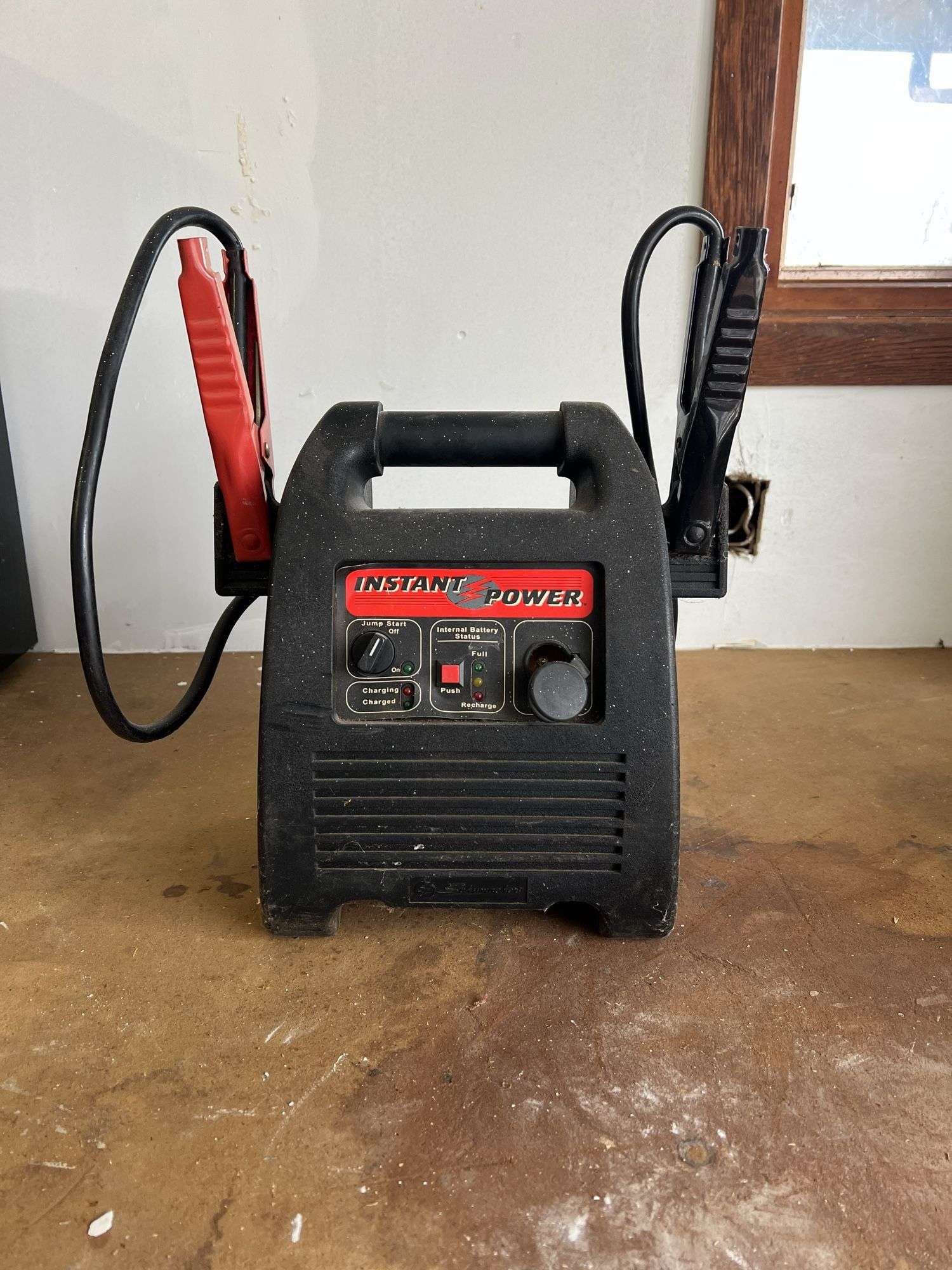 Instant Power battery charger - Kaufman Realty & Auctions
