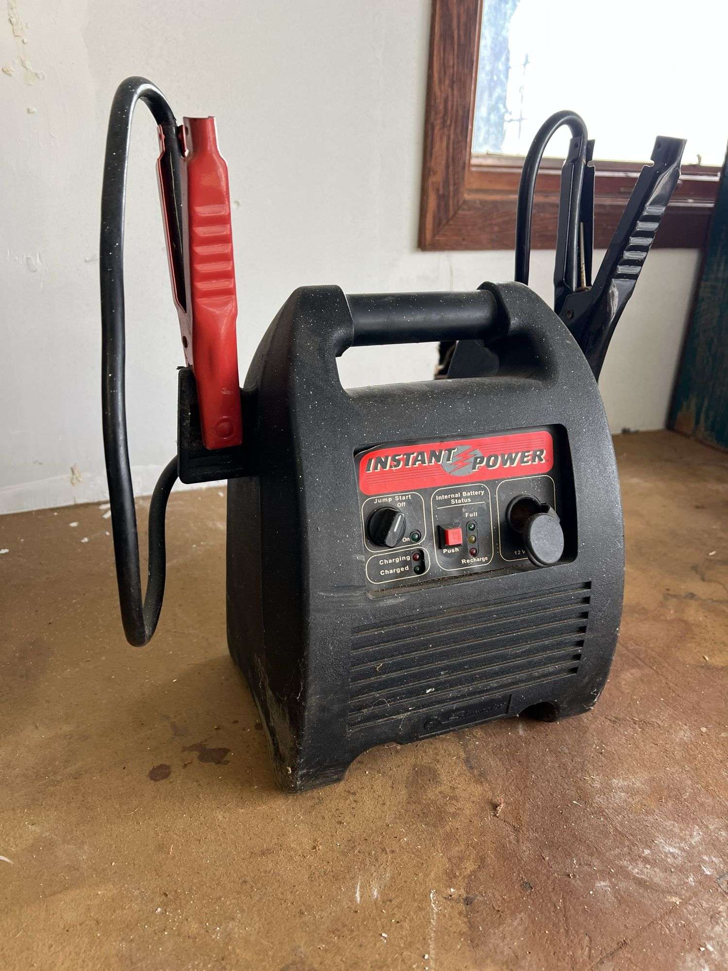 Instant Power battery charger - Kaufman Realty & Auctions