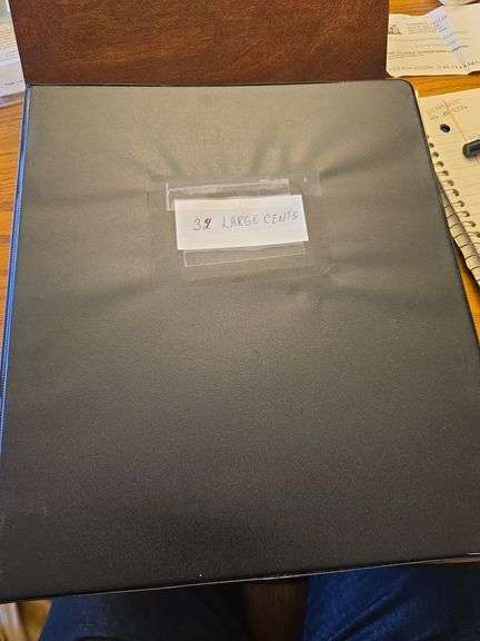 BINDER WITH 34 LARGE CENTS - Kaufman Realty & Auctions