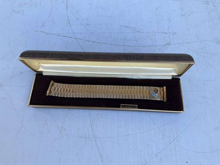Watch Band with 10 Karat Gold Emblem - Kaufman Realty & Auctions