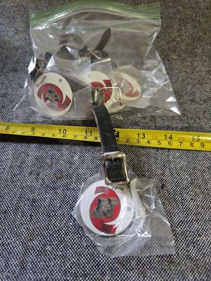 LOT OF 5 HONNEGERS FEED WATCH FOBS - Kaufman Realty & Auctions