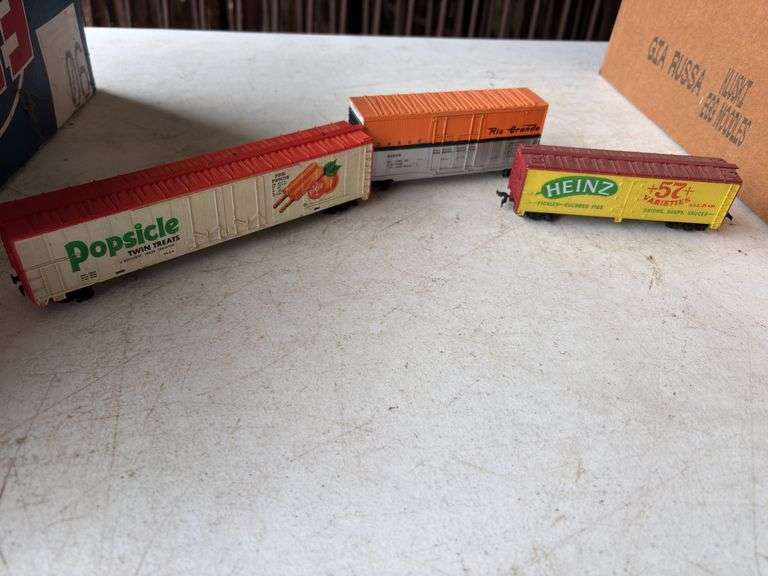 3 Boxes Model Train Cars - Kaufman Realty & Auctions