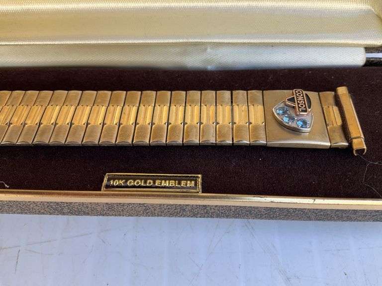 Watch Band with 10 Karat Gold Emblem - Kaufman Realty & Auctions