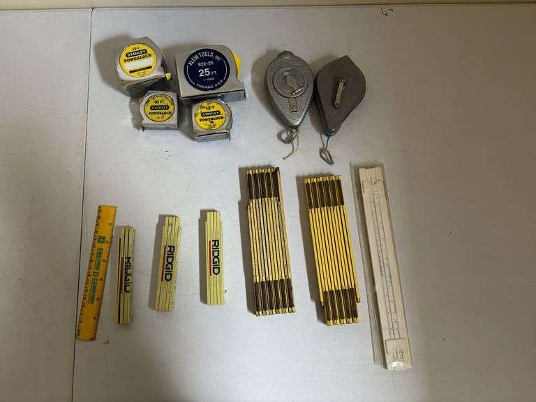 Folding rulers, tape measures and chalk lines - Kaufman Realty & Auctions