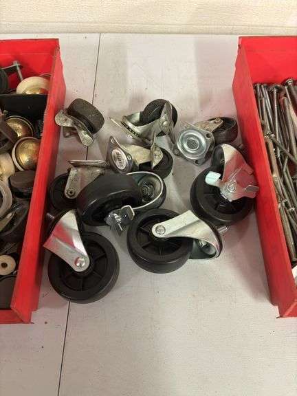 Assorted swivel casters and bolts - Kaufman Realty & Auctions