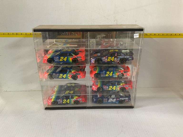 Display Case with 7 Jeff Gordon Collector Cars - Kaufman Realty & Auctions
