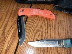 Buck 110, razor blade, knife - Kaufman Realty & Auctions