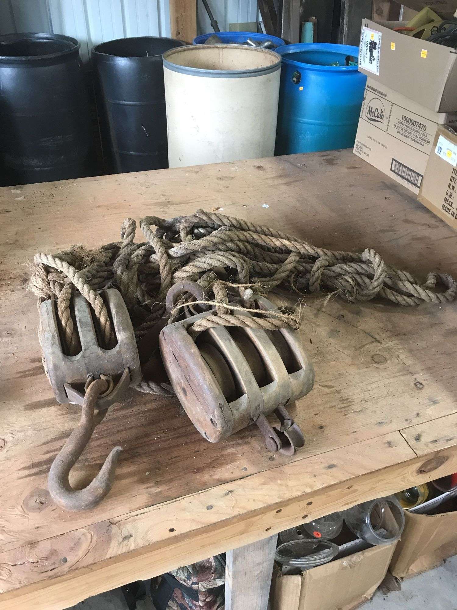 Antique large wooden pulleys and rope - Kaufman Realty & Auctions