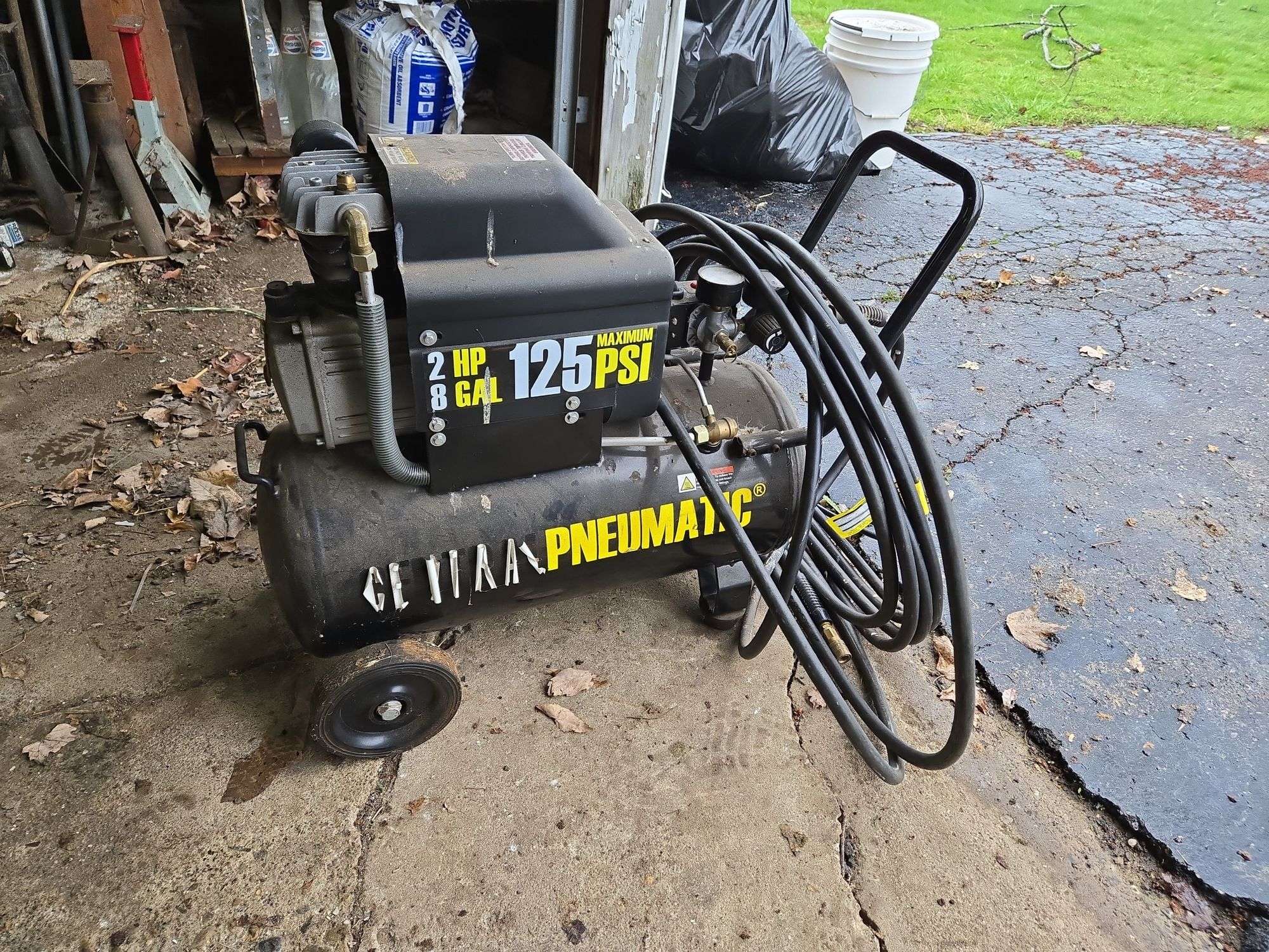 Pneumatic 8 gal air compressor - Kaufman Realty & Auctions