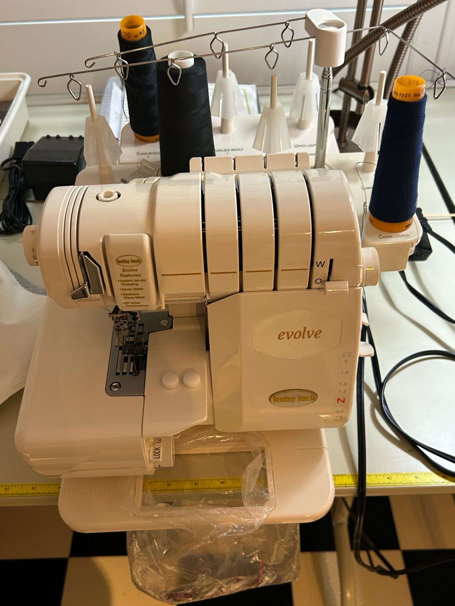 Baby Lock Evolve BLE-2. This is an 8-thread machine combining chain and ...