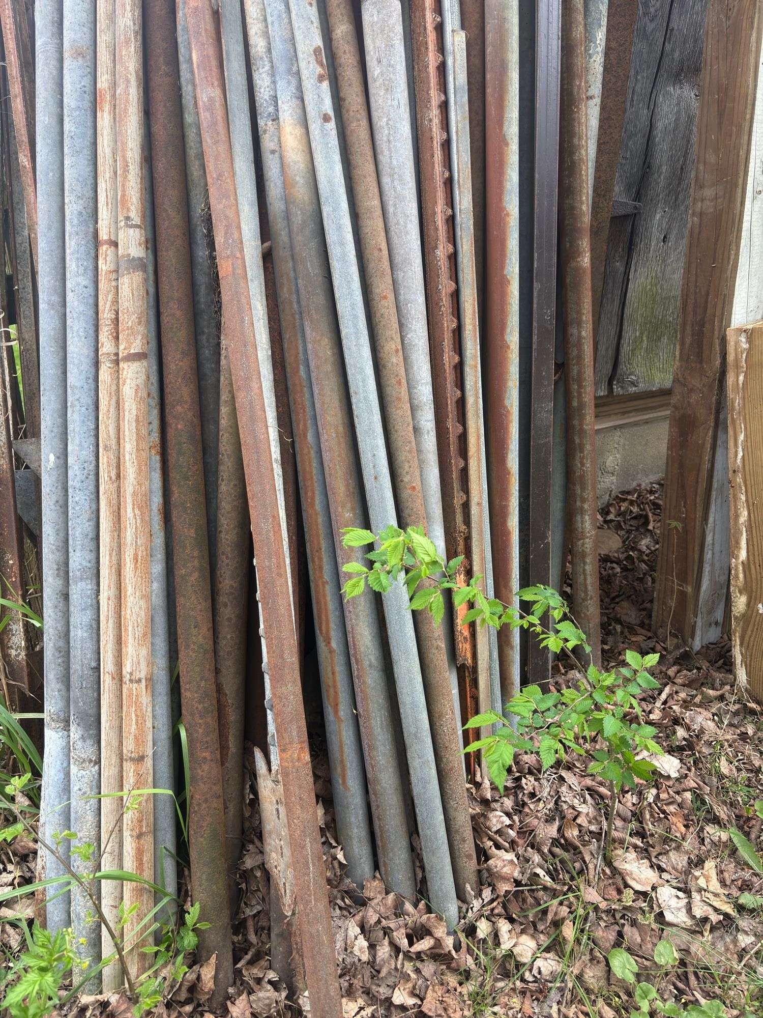 Pile of Posts & Pipes - Kaufman Realty & Auctions