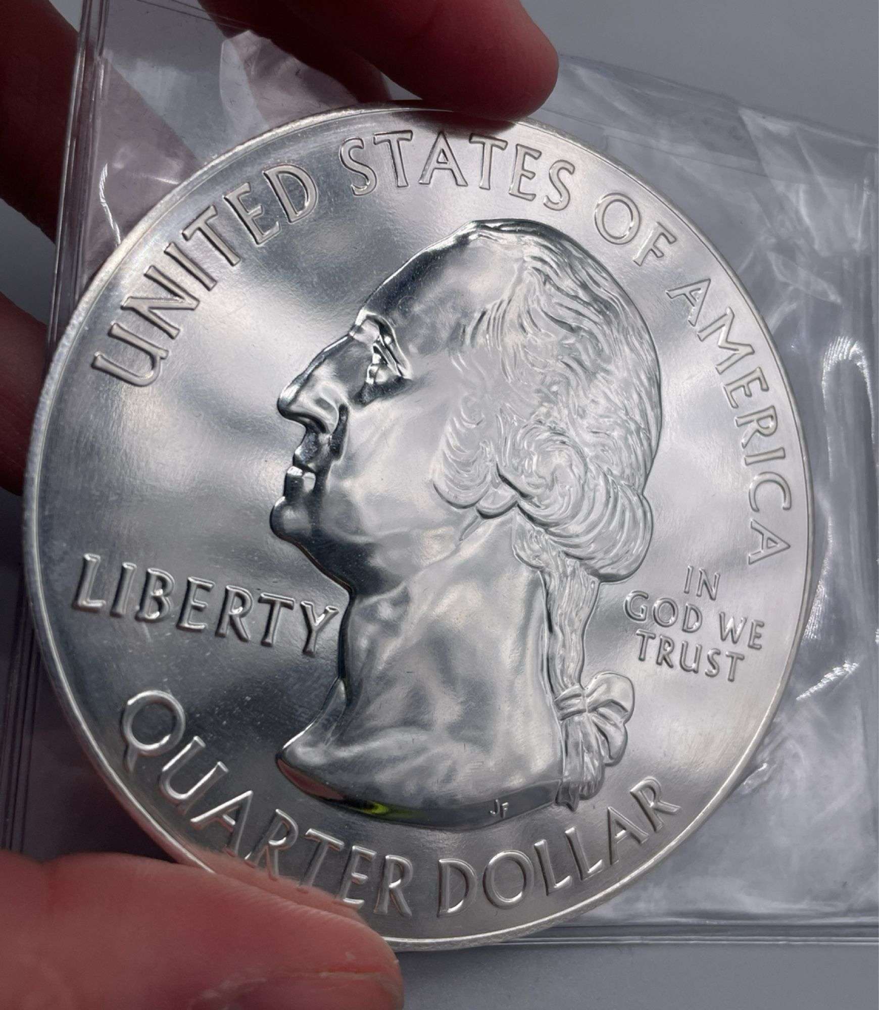 2015 5 0Z. SILVER PIECE DELAWARE - Kaufman Realty & Auctions