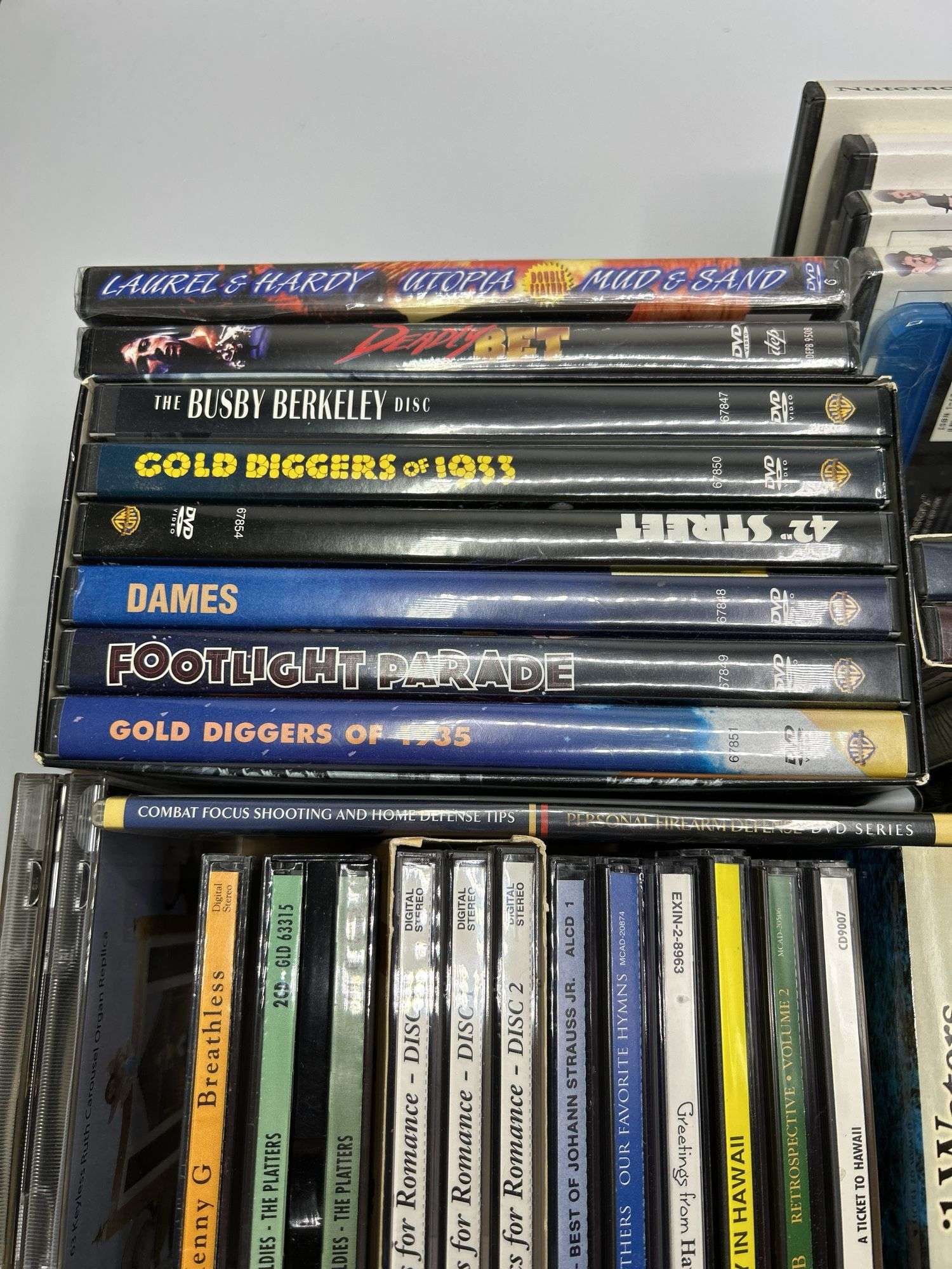 DVDS, CDS, AND BLUE RAY - Kaufman Realty & Auctions