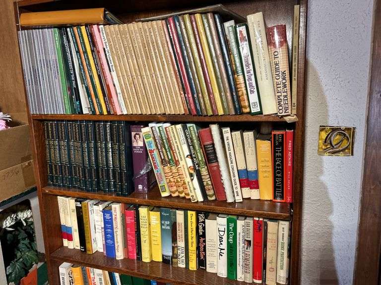 (3) shelves of books including Do-It-Yourself encyclopedias, The Life ...