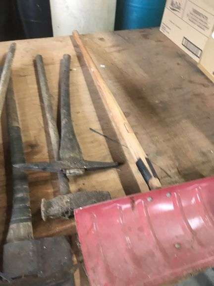 Antique long handled rake, shovel, brush cutter, hammer and pick ...