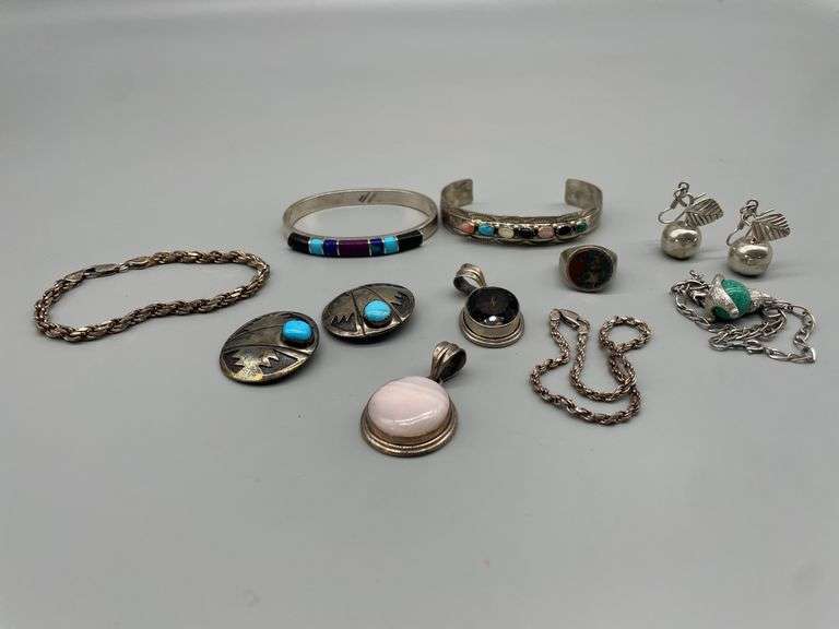 STERLING SILVER PIECES. 143 GRAMS GROSS WEIGHT - Kaufman Realty & Auctions