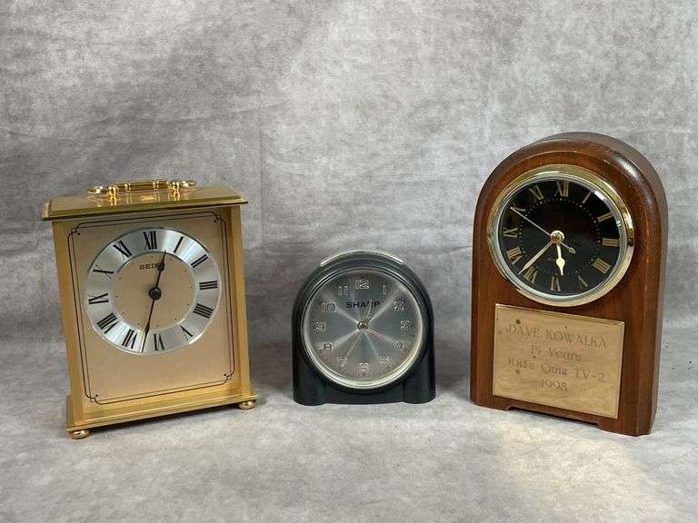 CLOCKS - SEIKO, SHARP, AND OTHER (1IS AN AWARD) - Kaufman Realty & Auctions