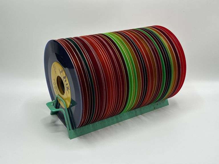 VINTAGE 45 RECORDS (COLORED VINYL) IN HOLDER - Kaufman Realty & Auctions
