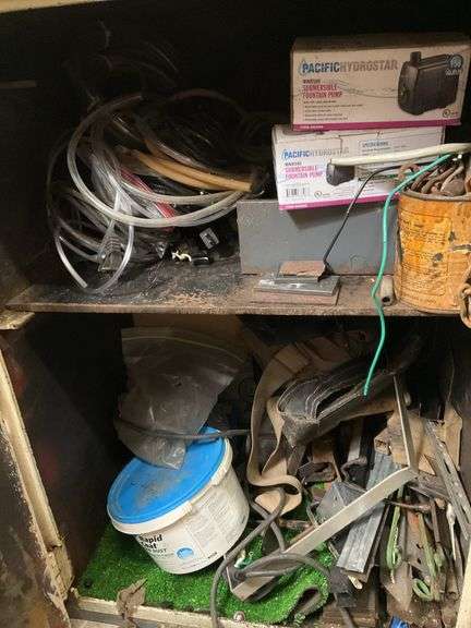 Contents of Cabinet - Kaufman Realty & Auctions