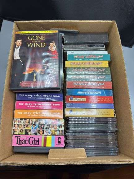 BOX OF VINTAGE DVDS - Kaufman Realty & Auctions