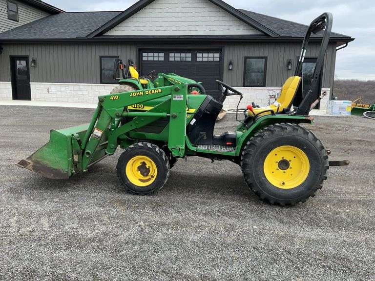John Deere 4100 w/ 410 front end loader, 4 wheel drive, 732 hrs. On ...