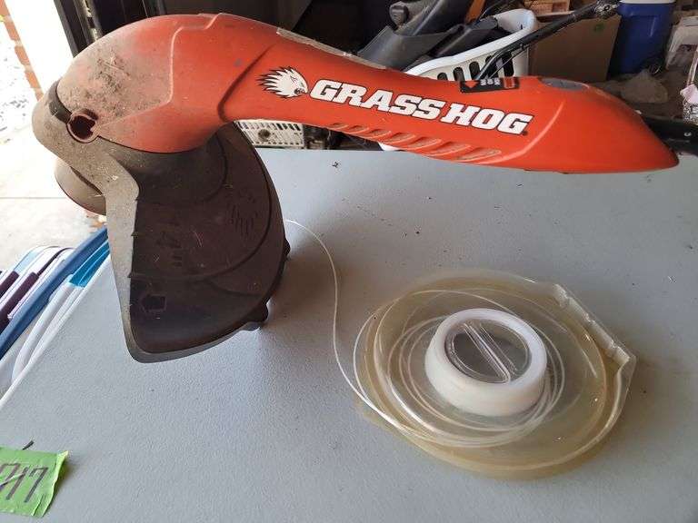 GRASS HOG WEED WACKER & LINE - Kaufman Realty & Auctions