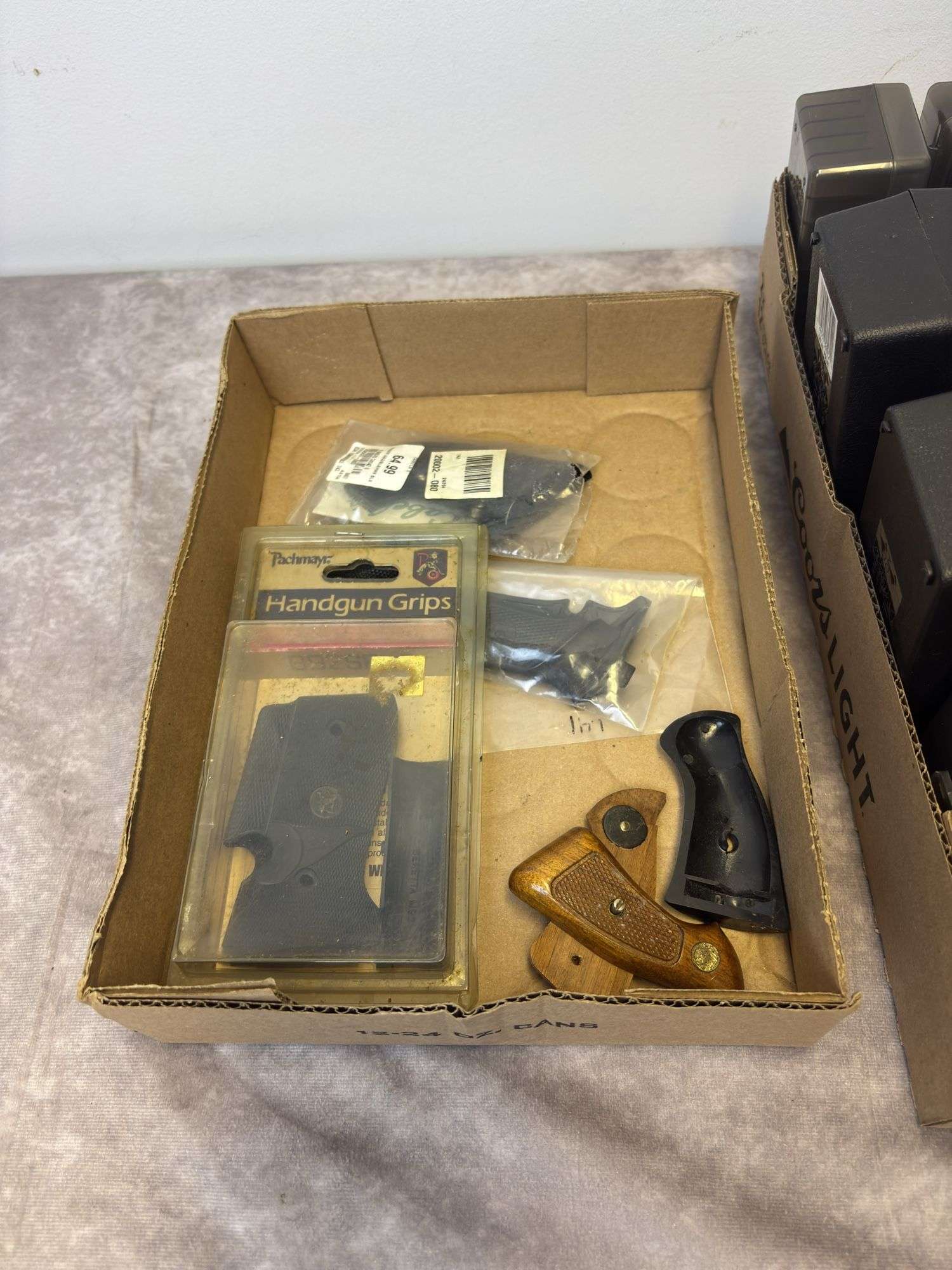 Hand Gun Grips & Ammo Boxes - Kaufman Realty & Auctions