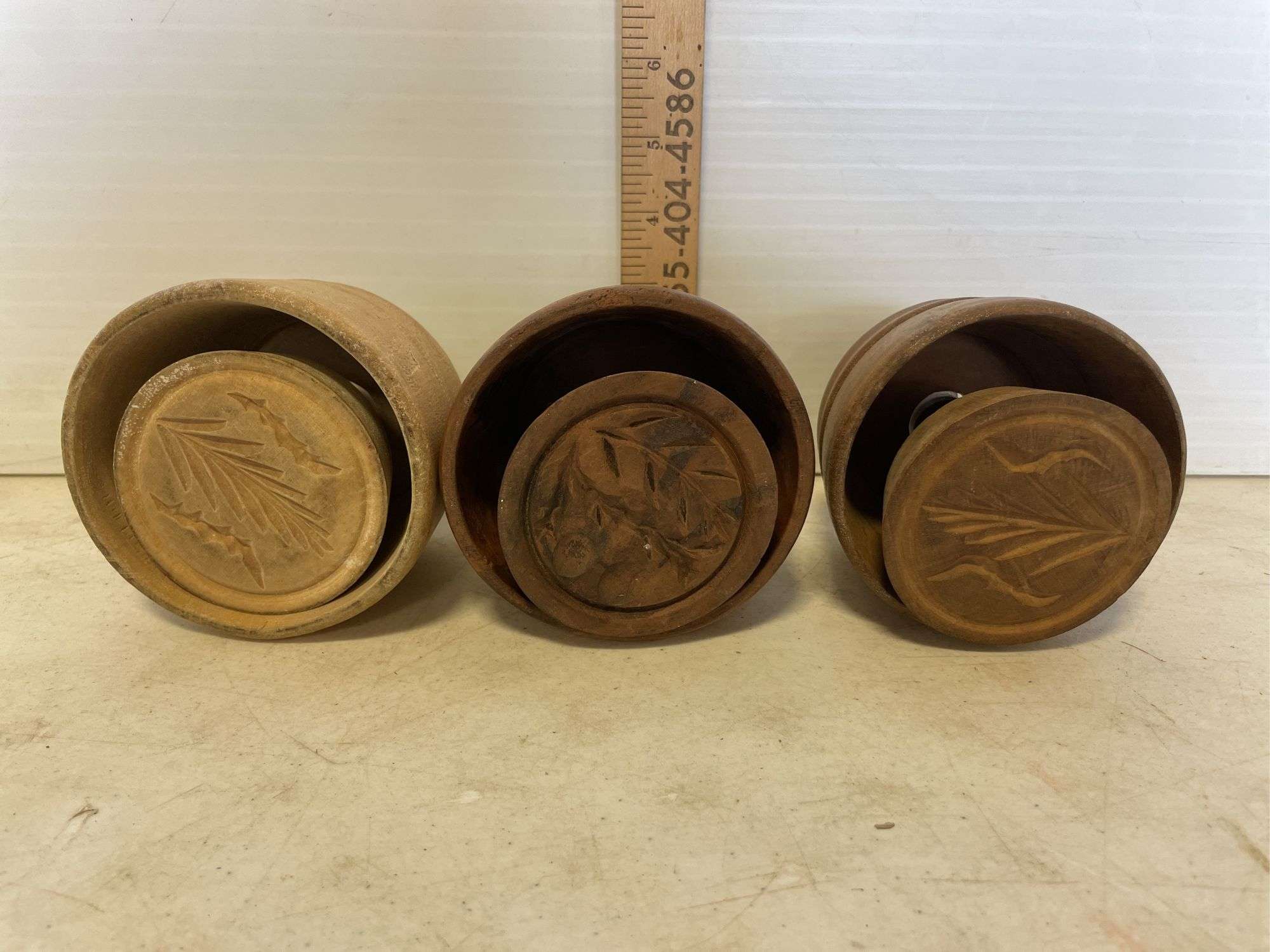 (3) wooden butter molds - Kaufman Realty & Auctions