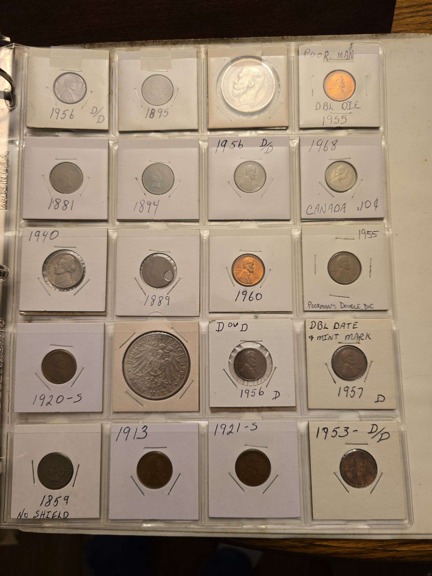 BINDER WITH 200 MISC COINS - Kaufman Realty & Auctions