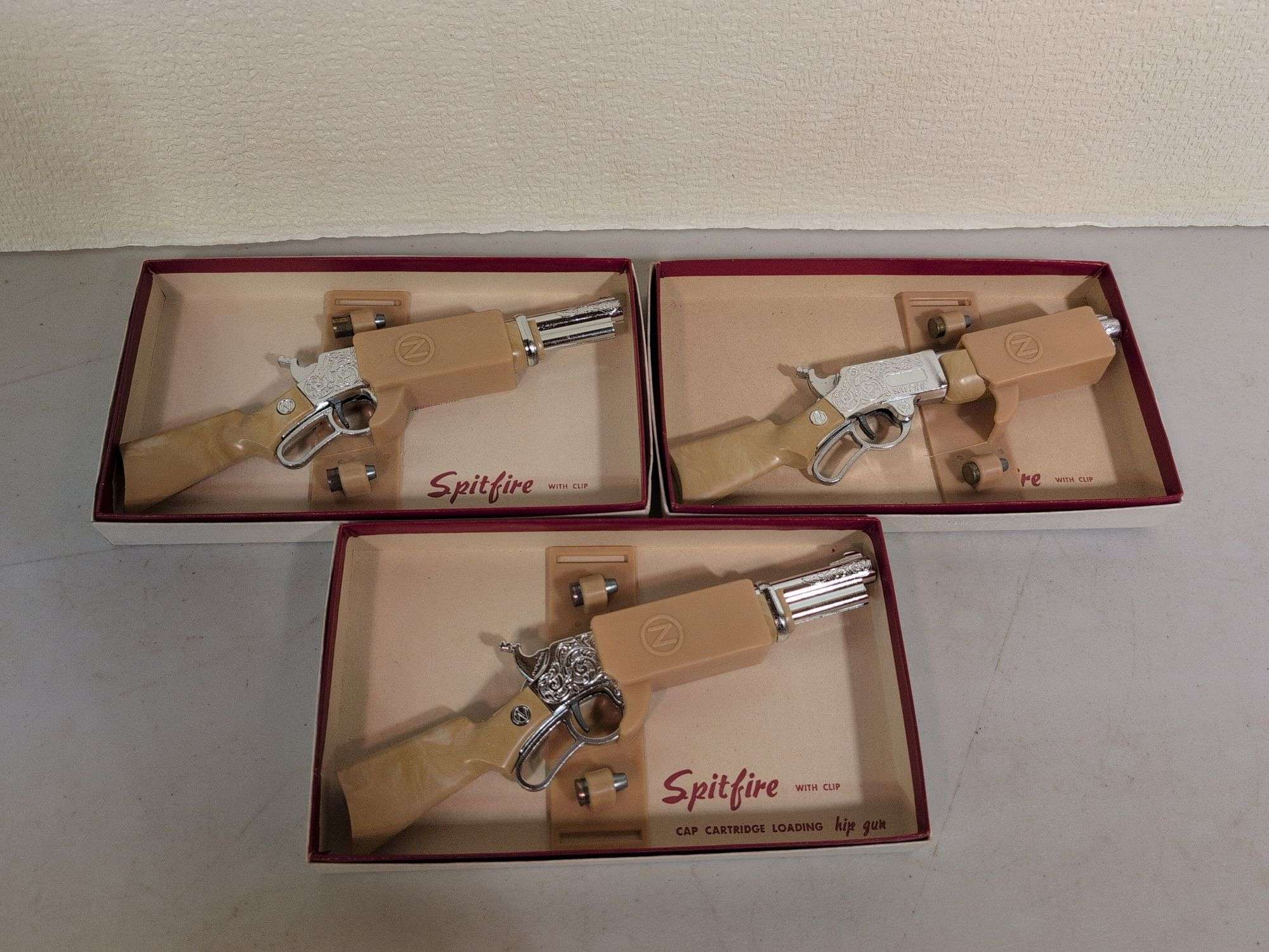 (3) Spitfire cap cartridge loading hip guns - original boxes - Kaufman ...