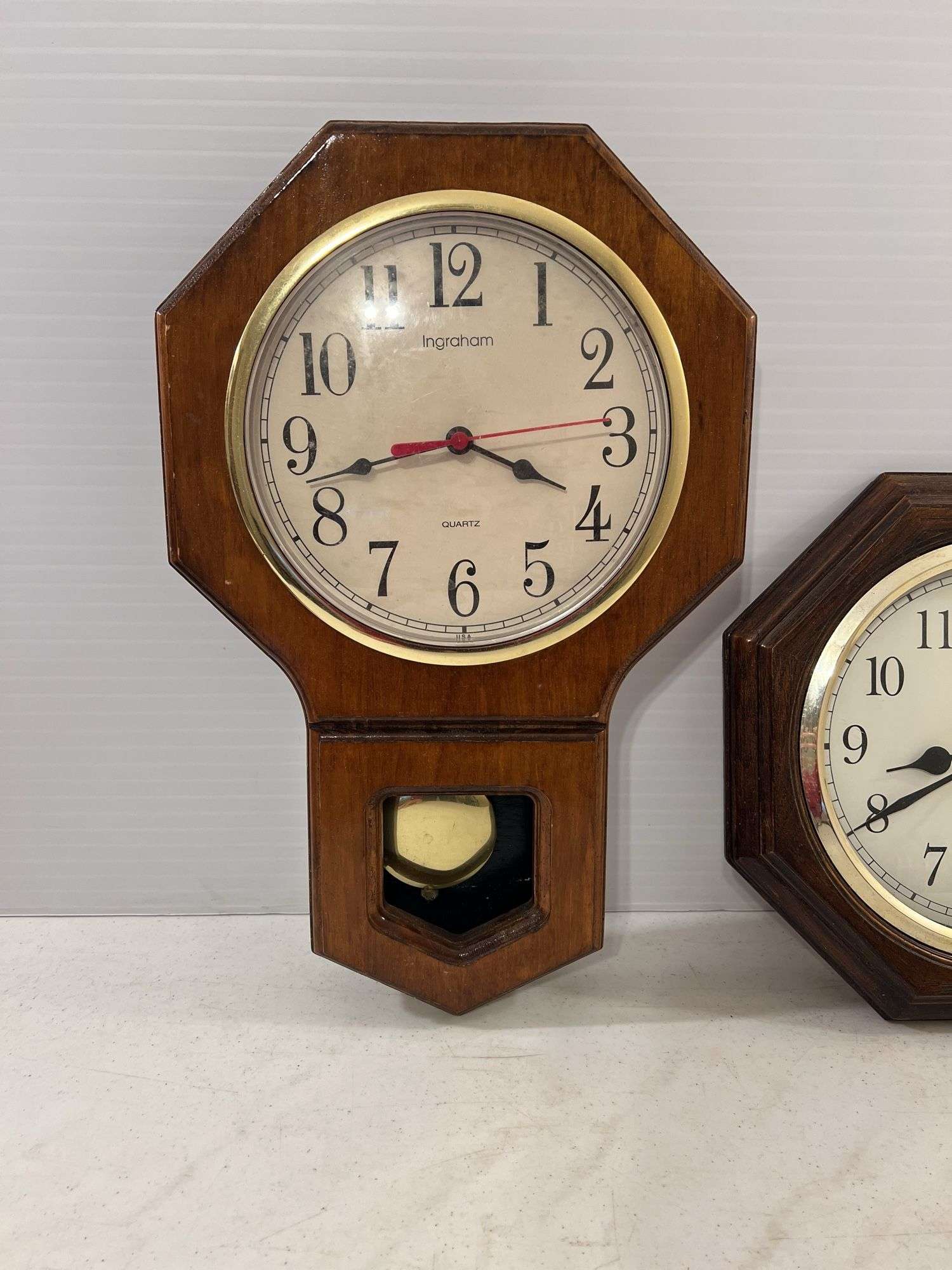 (2) Ingraham wall clocks - Kaufman Realty & Auctions