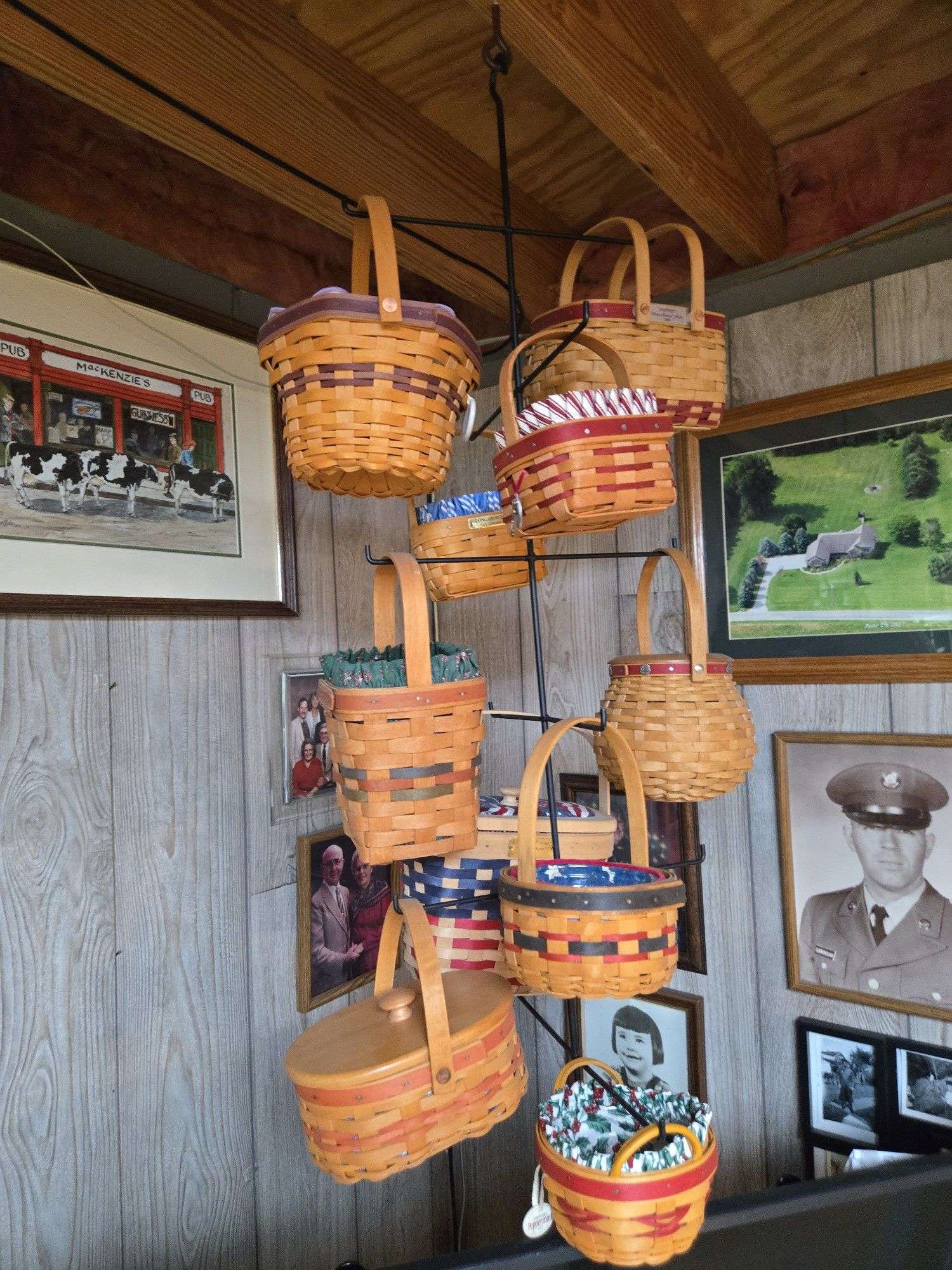 Metal rack w/ (10) Longaberger baskets - Kaufman Realty & Auctions