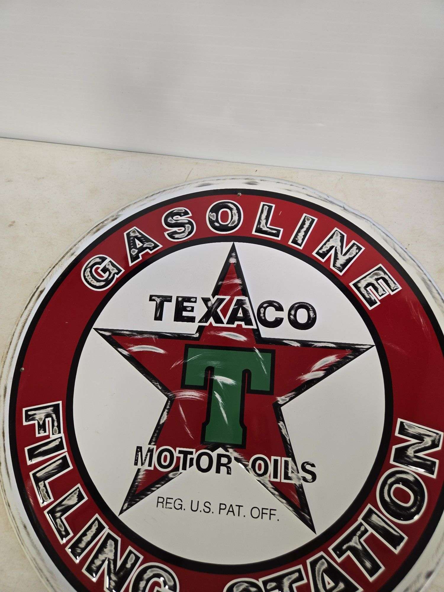 Tin Texaco sign- 23" - Kaufman Realty & Auctions
