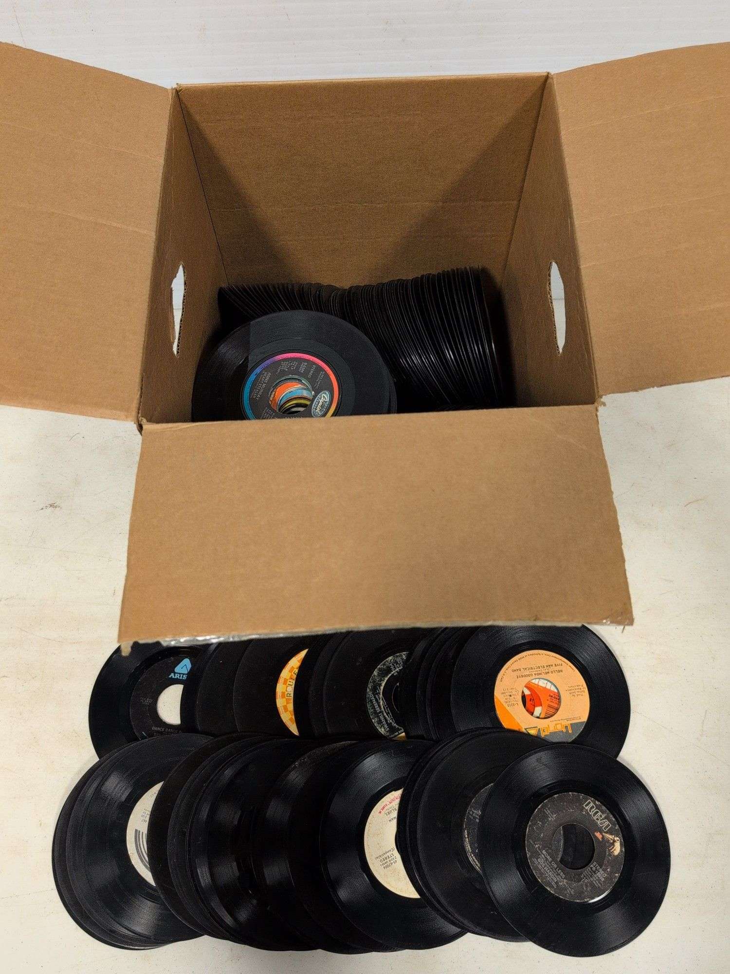 Box of 45 vinyl records - Kaufman Realty & Auctions