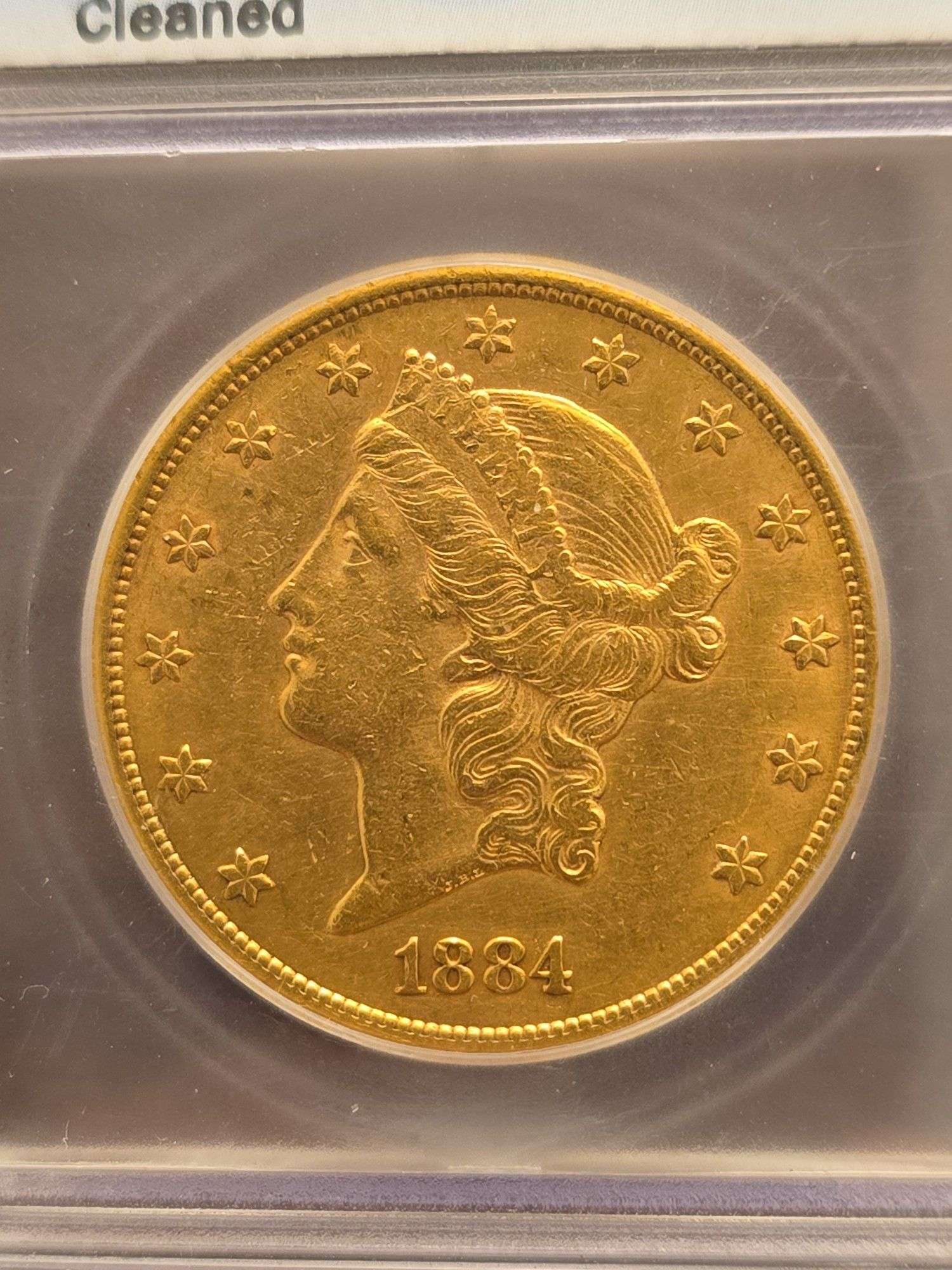 1884CC $20. LIBERTY HEAD GOLD PIECE ICG AU58 DETAILS CLEANED - Kaufman Realty & Auctions