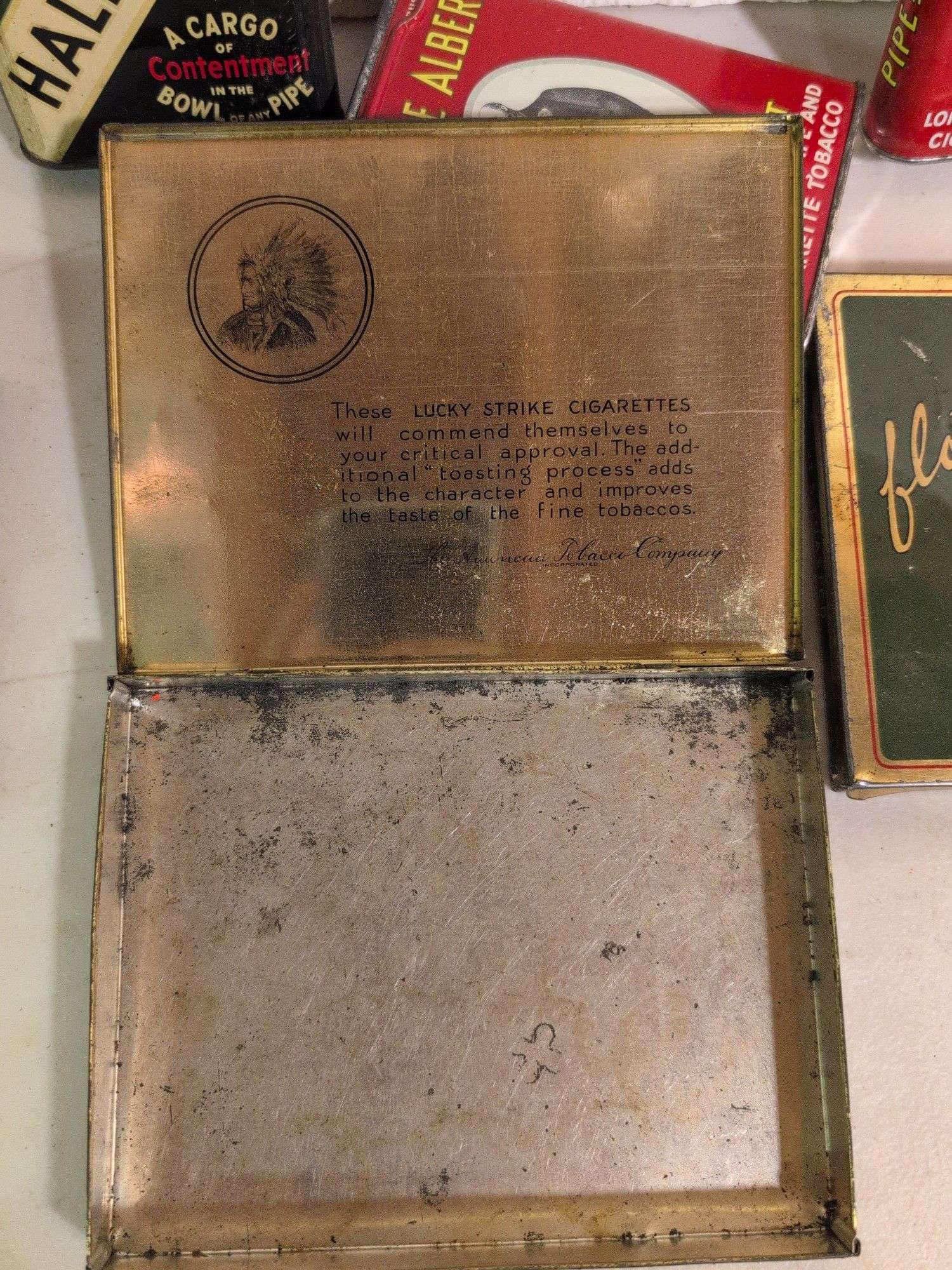 Prince Albert, Burley and Bright, and Lucky Strike tobacco tins ...