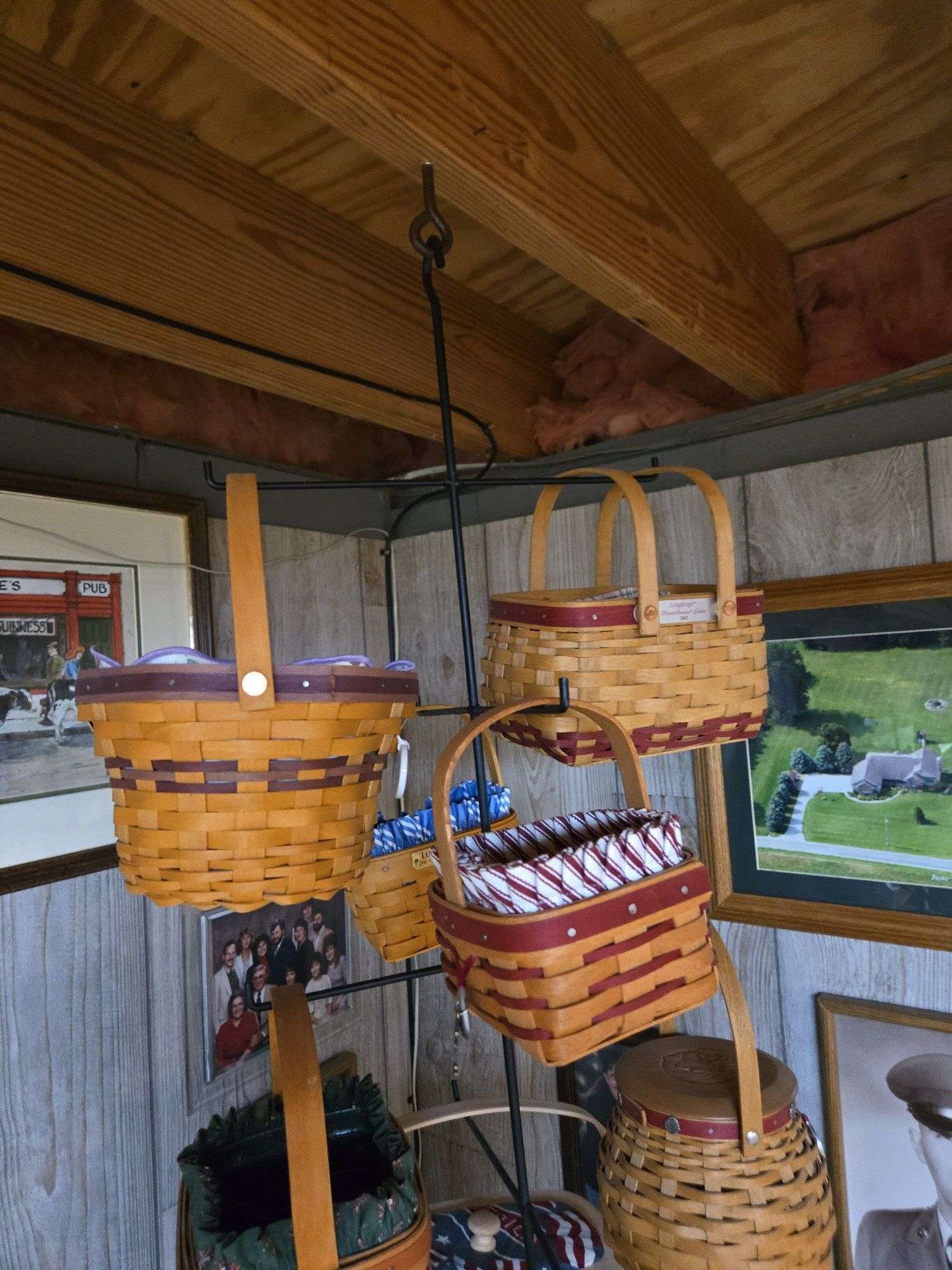 Metal rack w/ (10) Longaberger baskets - Kaufman Realty & Auctions