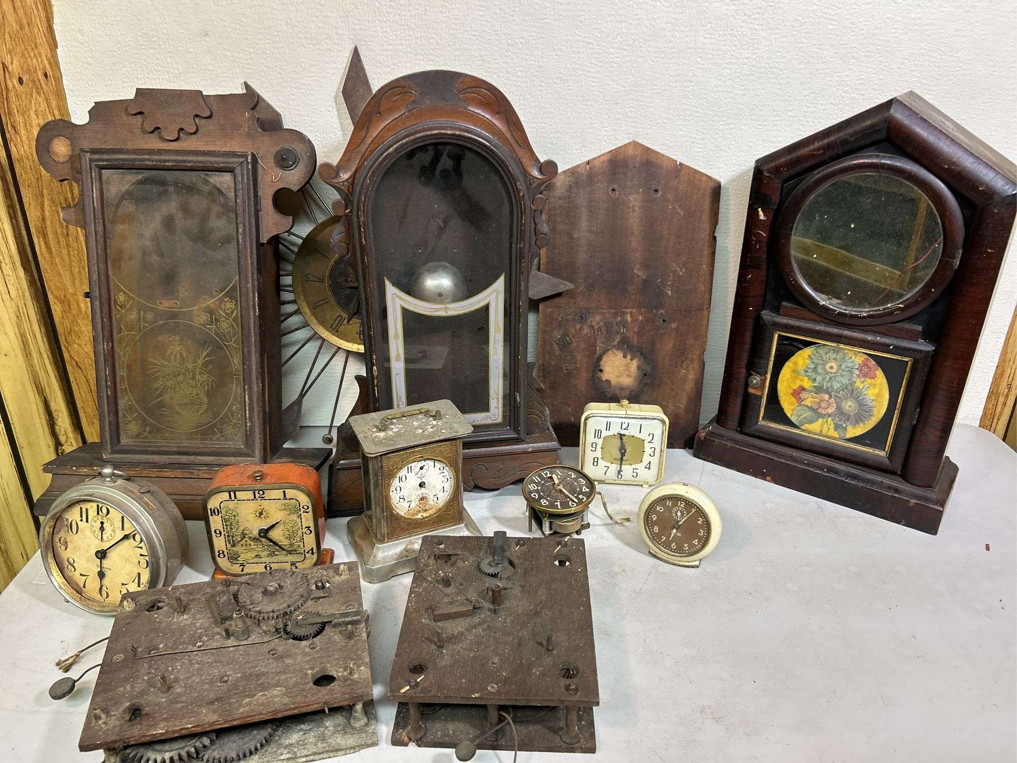 Large amount of Clock Parts including clock cases, alarm clocks and ...