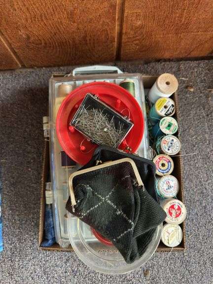 SEWING KIT, MATERIAL, WOODEN THREAD SPOOLS, BUTTONS, AND POCKET CHANGE ...